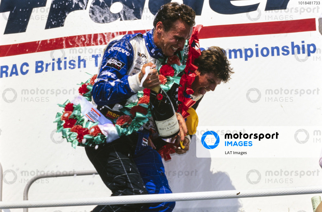Rickard Rydell, 1st position, sprays champagne on the podium. | Rounds ... Rickard Rydell, 1st position, sprays champagne on the podium. | Rounds ...